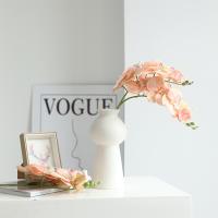 China A fresh and elegant 3D printed 7-head film Phalaenopsis artificial flower, light luxury home living room and dining table floral arrangement artificial flower for sale