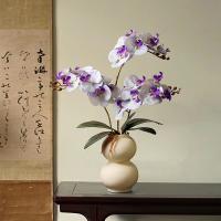China A fresh and elegant 3D printed 7-head film Phalaenopsis artificial flower, light luxury home living room and dining table floral arrangement artificial flower for sale