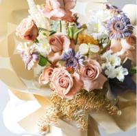 China Wave Dot Star Hera Paper Waterproof Floral Flower Packaging Paper for sale