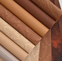 China Autumn and winter coffee color embossed floral flower wrapping paper for sale