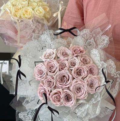 China Small lace waterproof packaging paper, flower packaging, opp film, bouquet packaging paper, fresh flower art, bouquet packaging for sale