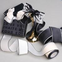 China 100m High Tenacity Shiny Black and White Border Snow Textile Belt DIY Bow Hair Accessories for Flower Shop Packaging Gift Box for sale