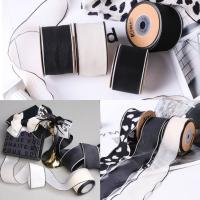 China 100m High Tenacity Shiny Black and White Border Snow Textile Belt DIY Bow Hair Accessories for Flower Shop Packaging Gift Box for sale
