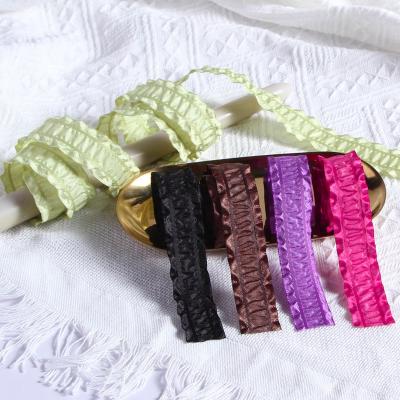 China Eco-friendly Folded Polyester Skirt Edge Woven Ribbon Bow for DIY Hair Accessories and Gift Box Packaging for sale