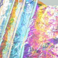 China Colorful film flower wrapping paper, pearlescent paper, laser rainbow, transparent seven-color candy paper, colorful flower wrapping material for sale