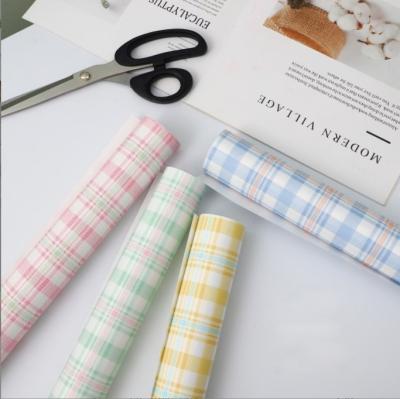 China Two-color checkered retro Ouya paper-wrapped flower paper checkered gift flower packaging bouquet wrapping paper wholesale materials for sale