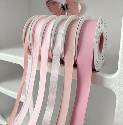 China Pink Memory Ribbon Flower Arrangement Packaging Hair Accessories Gift Packaging with Handmade DIY Bouquet for sale