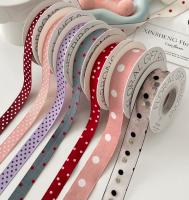 China DIY Packaging Essentials White Polka Dot Ribbon Man-Made Bow Tie and Floral Arrangement for sale