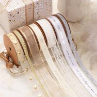 China Christmas Gift Decoration Snow Silk Ribbon 520 in Golden Polyester Gold and Silver Silk for sale
