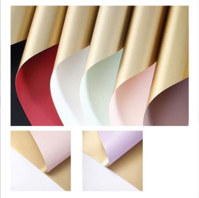 China Plastic Florist Wrapping Bouquet Packing Paper Valentine's Day Dual-Color Film Waterproof Gold Paper for Flower Packaging for sale