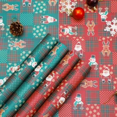China Flower Shop Gift Wrapping Paper with Santa Claus and Snowman Design on Waterproof Kraft Paper for sale