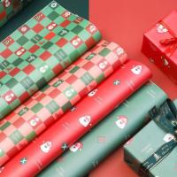 China Flower Shop Gift Wrapping Paper with Santa Claus and Snowman Design on Waterproof Kraft Paper for sale