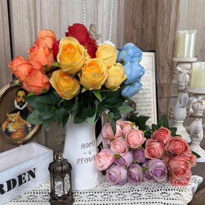China 7-head Corolla simulation rose, fake flower bouquet, silk flower, artificial flower, wedding hall, high-end living room decoration ornament for sale