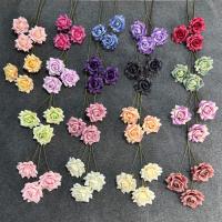 China Three head embossed rose wedding decoration flower material flower wall background simulation flower home soft decoration rose finished product for sale