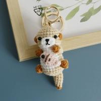 China Knitting Amigurumi Cute Plush Otter Holding Fish Keychain Oyuncak Crochet Animal Toys Doll Soft Crocheted Otter Keychains for sale