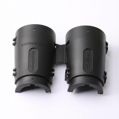 China Black thermoplastic backshell cover for size 24 AHDP series connectors supporting corrugated tube cable exits Amphenol AHDPBS-010-2405 for sale
