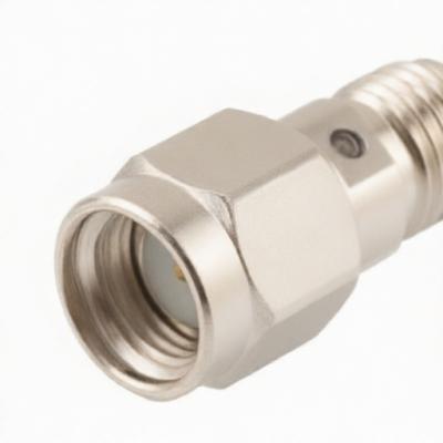 China SMA female to RP-SMA male coaxial adapter L-com LCAD30030 supports DC to 18 GHz with 50 ohm impedance for sale