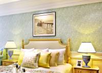 China Classic Style Embossed Living Room Wallpaper with Light Green Floral Pattern for sale