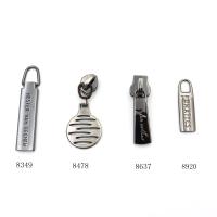 China Corrosion Resistant Custom Zipper Pull Shiny Black Handbag Zipper Pull With Engraving Logo for sale