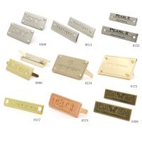 China Custom Engraved Metal Logo Tag for Handbag Zinc Alloy Name Plate 100000 Cycles Mold for sale