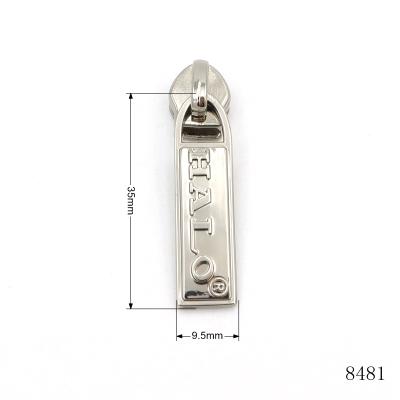 China Embossed Custom Logo Zipper Pulls Nickel Plated Handbag Zipper Pulls for sale