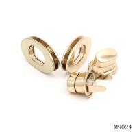 China 38mm Oval Twist Lock Gold Metal Bag Closure for Handbag Hardware for sale