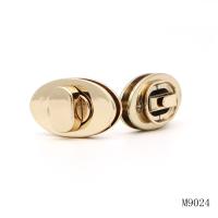 China 38mm Oval Twist Lock Gold Metal Bag Closure for Handbag Hardware for sale