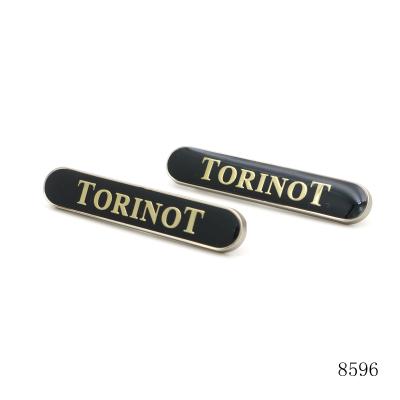 China Custom Engraved Epoxy Name Plate Black Logo Tag for Handbags 30mm for sale