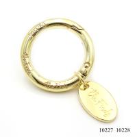 China Custom Oval Engraved Metal Key Tags 25x15mm Zinc Alloy Logo Charms Corrosion Resistant for sale