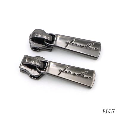 China Anti Fade Metal Zipper Puller Shiny Custom Gunmetal Zipper Pull for Bags 30 Years OEM for sale