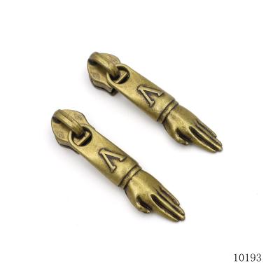 China Hand Shape Zipper Pull Charm Matte Antique Brass Zipper Pull OEM ODM for sale