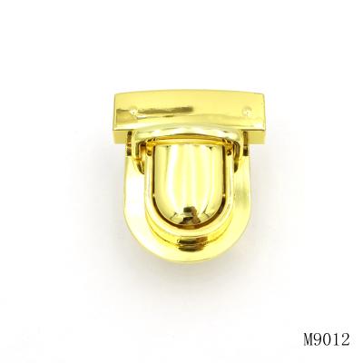 China Zinc Alloy Bag Lock Clasp 49.6mm Gold Purse Latch Hardware for Luggage for sale