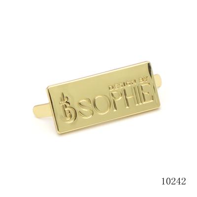 China Custom Metal Logo Tag Gold Bag Name Plate OEM ODM 20 Years Experience 3000 Molds for sale