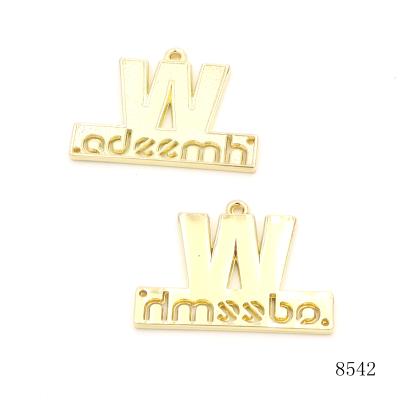 China Custom Metal Logo Tag Anti Fade Gold Letter Tags for Bag Brand Name 20mm for sale