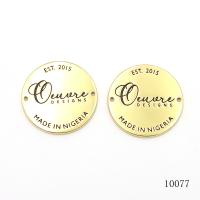 China Custom 38mm Gold Metal Logo Tag Round Bag Charm with Black Oil Text for Brand Name Tags for sale