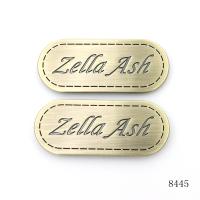 China Custom Die Casting Brass Name Plates Oval Shape Engraved Metal Logo for Handbag 20x30mm for sale