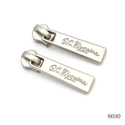 China Custom Metal Zipper Pull Silver Gold Pink Gunmetal Zipper Pull For Jacket for sale