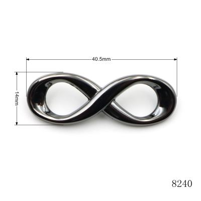 China Polished Infinity Shape Custom Metal Logo Plate 40.5mm for Bags and Accessories for sale