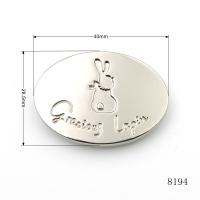 China Custom Engraved Oval Metal Logo Plate 40mm x 28.5mm Shiny Silver Plating for Bags for sale