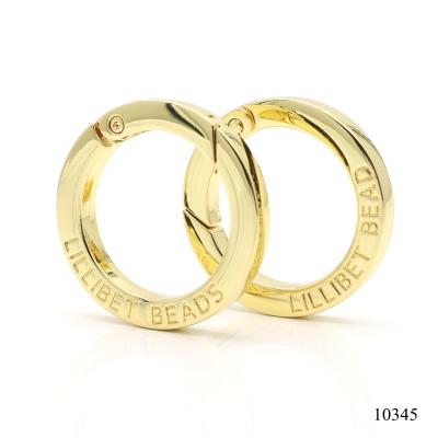 China Custom Engraved Gold Metal Spring Ring Clasp 36.2mm Flat Open Gate Ring for Bag Keychain for sale