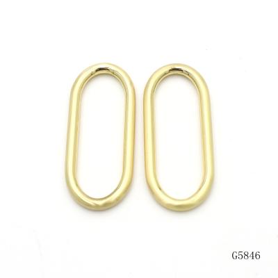 China Bag Accessories Strap Buckle Zinc Alloy Die Casting Oval Ring Buckle Slider Adjuster Loop Buckle for sale