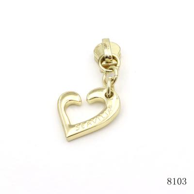 China 25mm Custom Light Gold Hollow Heart Metal Zipper Pull Charm with Matching Zipper Slider, Decorative Zipper Hardware for Handbags & Cosmetic Pouches for sale