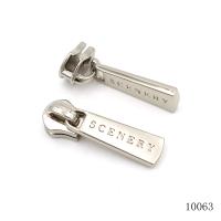 China Nickel Logo Engraved Metal Zipper Puller Customized Shape Size Metal Zipper Puller Label For Handbag for sale