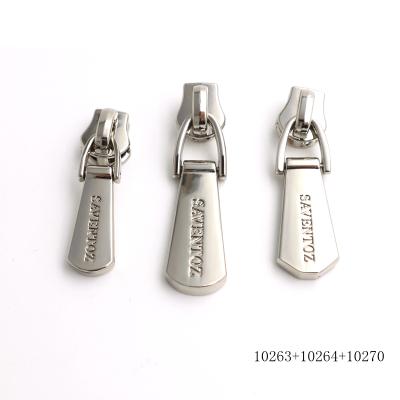 China Brand Logo Engraved Nickel Gold Metal Zipper Puller Accessories Customized Long Shape Logo Engraved Metal Logo Zipper Puller Label For Handbag for sale
