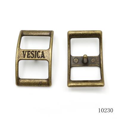 China Antique Brass Metal Conway Buckle Leather Belt Curved Slider Buckle 38mm Custom Logo for sale