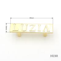 China Custom Embossed Zinc Alloy Metal Nameplate Double Prongs Brand Logo Tag for Bag 25mm for sale