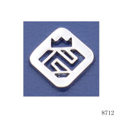 China Small Bag Cap Purse Metal Label Logo Custom Metal Hollow Out Logo Tag for Decorations for sale