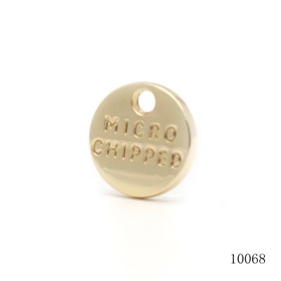 China New Gold Metal Round Tag Custom Logo Label Mini Size Circle Tag For Handbag Clothing Accessories for sale