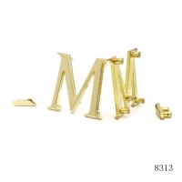 China Golden Custom Metal M Letter Custom Shape Metal Logo Zinc Alloy Brand Logo Label  For Clothing for sale