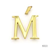 China Golden Custom Metal M Letter Custom Shape Metal Logo Zinc Alloy Brand Logo Label  For Clothing for sale